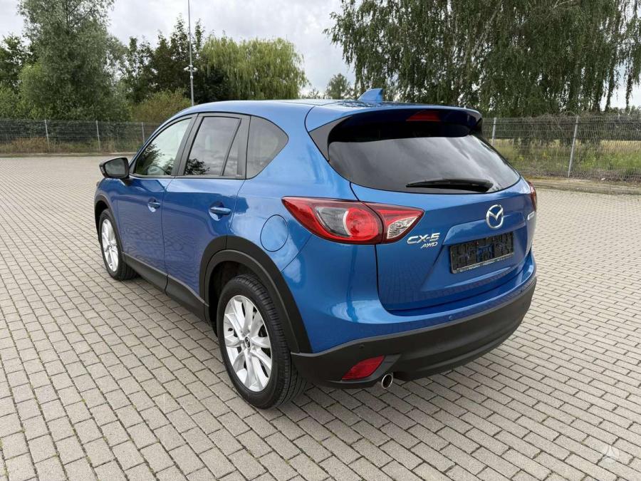 Zils Mazda CX-5 2012 Marijampole, ar dzinēja tilpumu 2.19 L un nobraukumu 179 tūkst. km par 6200 €, foto 4 vietnē AUTOMOTO.COM.LV