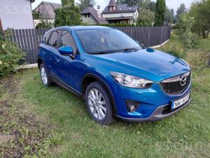 Blue Mazda CX-5 2012 in Riga, with an engine capacity of 2.20 L and mileage of 212 thousand km for 9550 €, photo 3 on AUTOMOTO.COM.LV