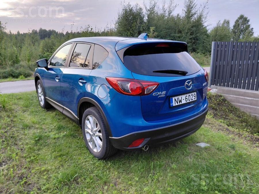 Blue Mazda CX-5 2012 in Riga, with an engine capacity of 2.20 L and mileage of 212 thousand km for 9550 €, photo 4 on AUTOMOTO.COM.LV