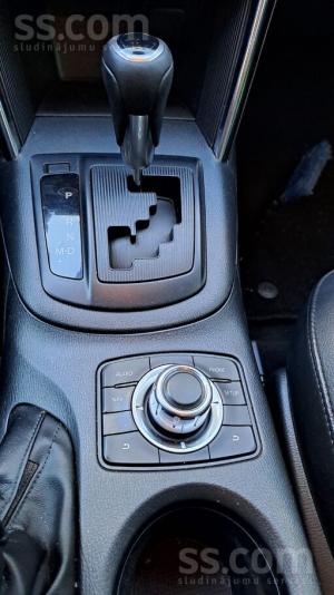 Blue Mazda CX-5 2012 in Riga, with an engine capacity of 2.20 L and mileage of 212 thousand km for 9550 €, photo 8 on AUTOMOTO.COM.LV