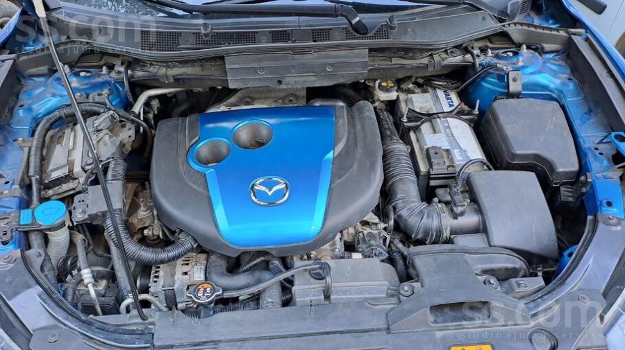 Blue Mazda CX-5 2012 in Riga, with an engine capacity of 2.20 L and mileage of 212 thousand km for 9550 €, photo 12 on AUTOMOTO.COM.LV