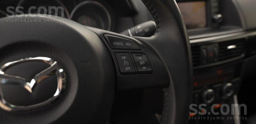Blue Mazda CX-5 2012 in Riga, with an engine capacity of 2.20 L and mileage of 212 thousand km for 9550 €, photo 23 on AUTOMOTO.COM.LV