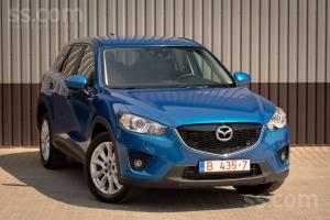 Zils Mazda CX-5 2012 Tukums, ar dzinēja tilpumu 2.20 L un nobraukumu 117 tūkst. km par 10950 €, foto  vietnē AUTOMOTO.COM.LV