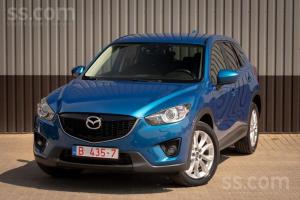 Zils Mazda CX-5 2012 Tukums, ar dzinēja tilpumu 2.20 L un nobraukumu 117 tūkst. km par 10950 €, foto 4 vietnē AUTOMOTO.COM.LV