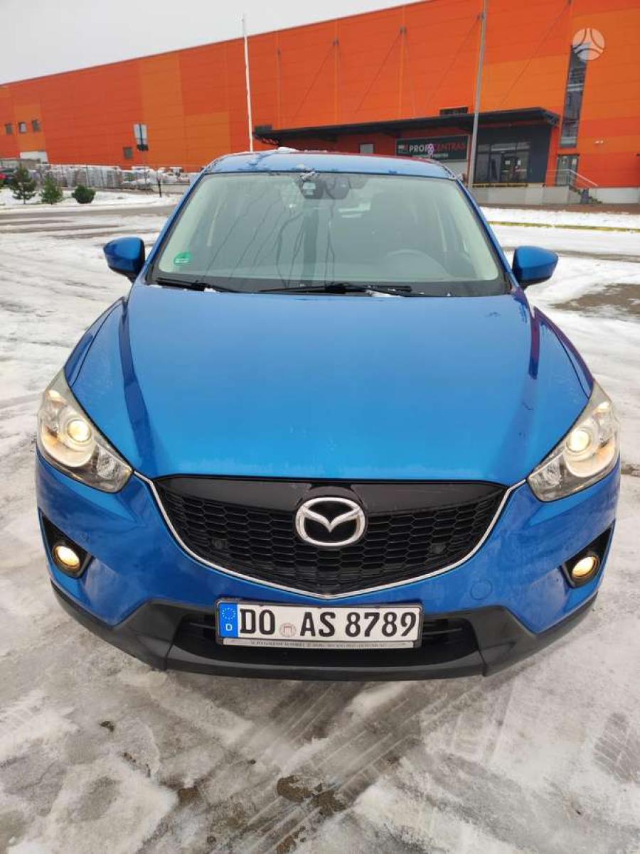 Blue Mazda CX-5 2013 in Vilnius, with an engine capacity of 2.19 L and mileage of 182 thousand km for 7499 €, photo 2 on AUTOMOTO.COM.LV
