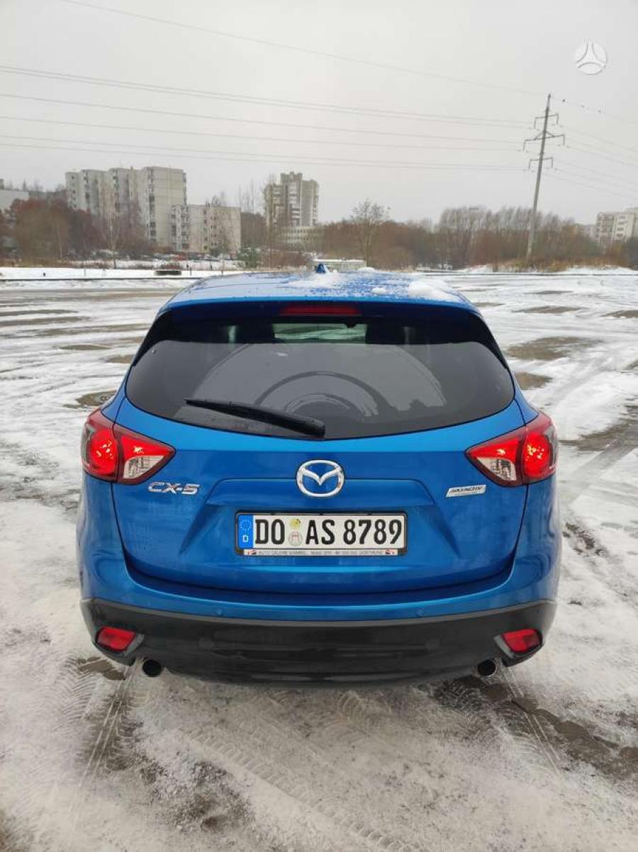 Blue Mazda CX-5 2013 in Vilnius, with an engine capacity of 2.19 L and mileage of 182 thousand km for 7499 €, photo 6 on AUTOMOTO.COM.LV