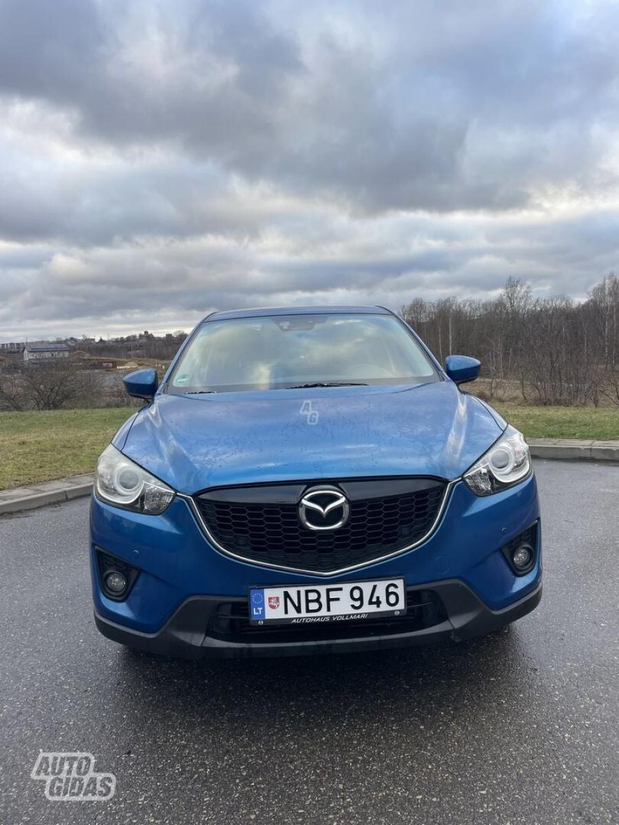 Blue Mazda CX-5 2013 in Vilnius, with an engine capacity of 2.20 L and mileage of 178 thousand km for 7000 €, photo 4 on AUTOMOTO.COM.LV