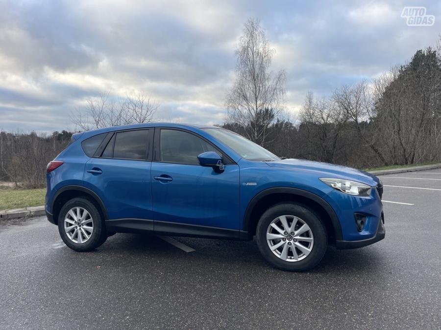 Blue Mazda CX-5 2013 in Vilnius, with an engine capacity of 2.20 L and mileage of 178 thousand km for 7000 €, photo 5 on AUTOMOTO.COM.LV