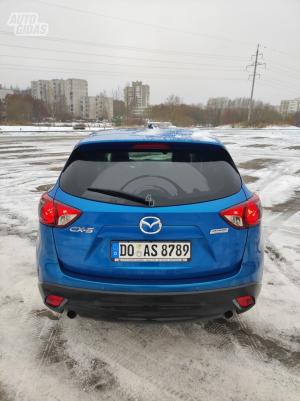 Zils Mazda CX-5 2013 Viļņa, ar dzinēja tilpumu 2.20 L un nobraukumu 182 tūkst. km par 7499 €, foto 8 vietnē AUTOMOTO.COM.LV