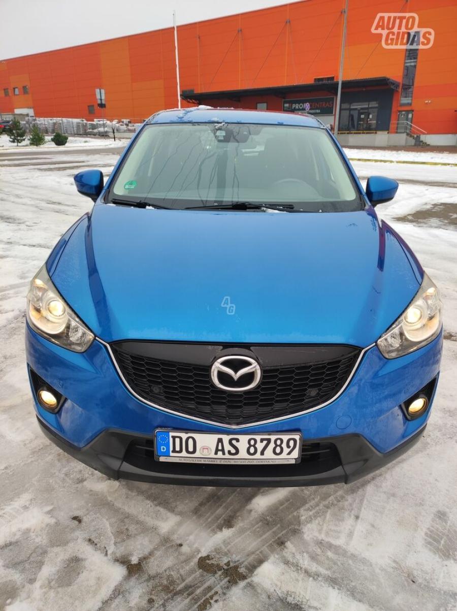 Blue Mazda CX-5 2013 in Vilnius, with an engine capacity of 2.20 L and mileage of 182 thousand km for 7499 €, photo 3 on AUTOMOTO.COM.LV