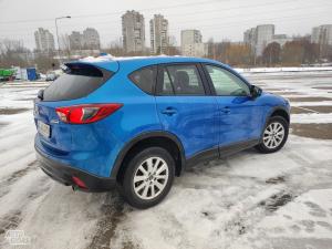 Blue Mazda CX-5 2013 in Vilnius, with an engine capacity of 2.20 L and mileage of 182 thousand km for 7499 €, photo 4 on AUTOMOTO.COM.LV