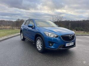 Blue Mazda CX-5 2013 in Vilnius, with an engine capacity of 2.19 L and mileage of 180 thousand km for 7000 €, photo 3 on AUTOMOTO.COM.LV