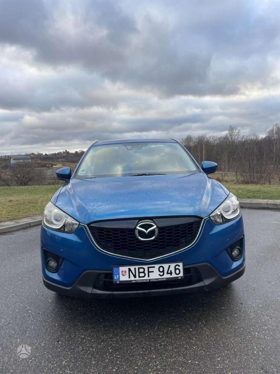 Blue Mazda CX-5 2013 in Vilnius, with an engine capacity of 2.19 L and mileage of 180 thousand km for 7000 €, photo 4 on AUTOMOTO.COM.LV