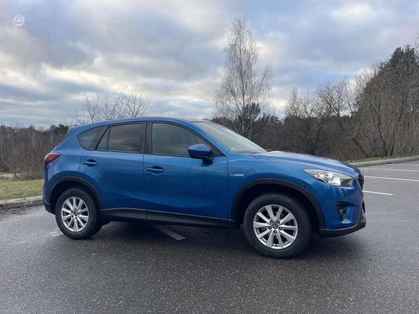 Zils Mazda CX-5 2013 Viļņa, ar dzinēja tilpumu 2.19 L un nobraukumu 180 tūkst. km par 7000 €, foto 5 vietnē AUTOMOTO.COM.LV