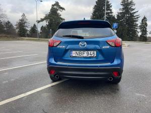 Blue Mazda CX-5 2013 in Vilnius, with an engine capacity of 2.19 L and mileage of 180 thousand km for 7000 €, photo 7 on AUTOMOTO.COM.LV