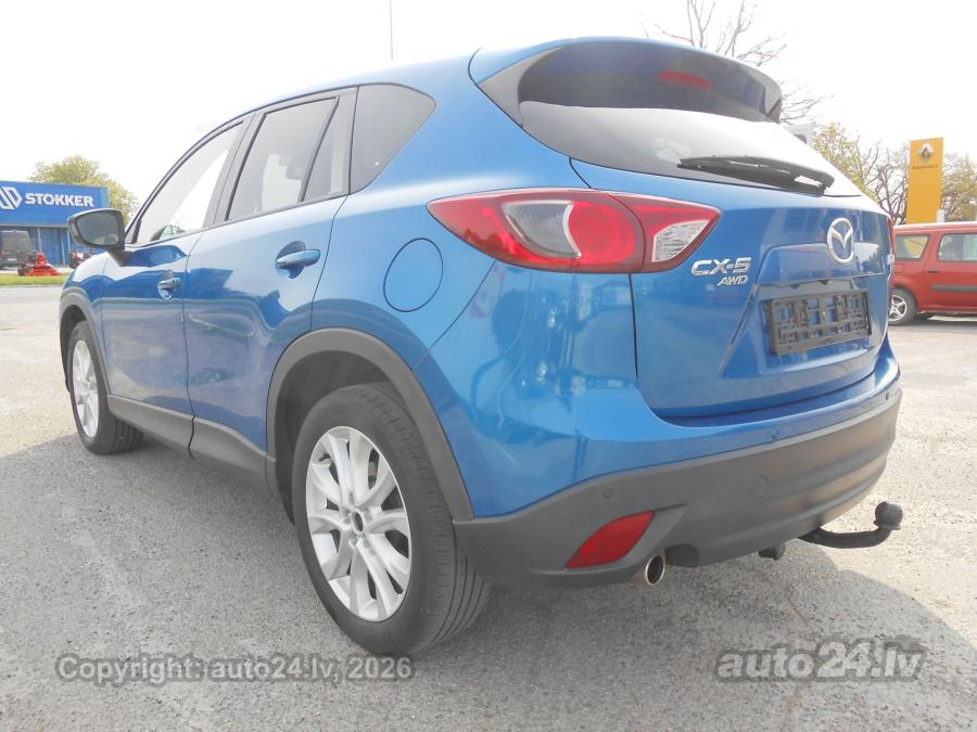 Blue Mazda CX-5 2013 in Viljandi, with an engine capacity of 2.20 L and mileage of 226 thousand km for 7990 €, photo 5 on AUTOMOTO.COM.LV