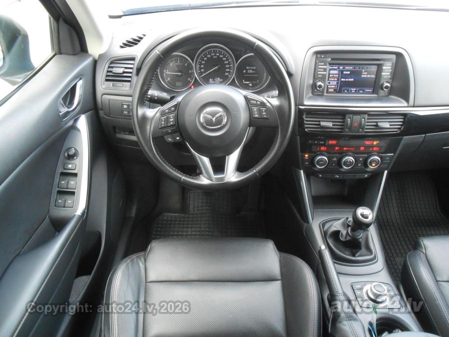 Blue Mazda CX-5 2013 in Viljandi, with an engine capacity of 2.20 L and mileage of 226 thousand km for 7990 €, photo 6 on AUTOMOTO.COM.LV