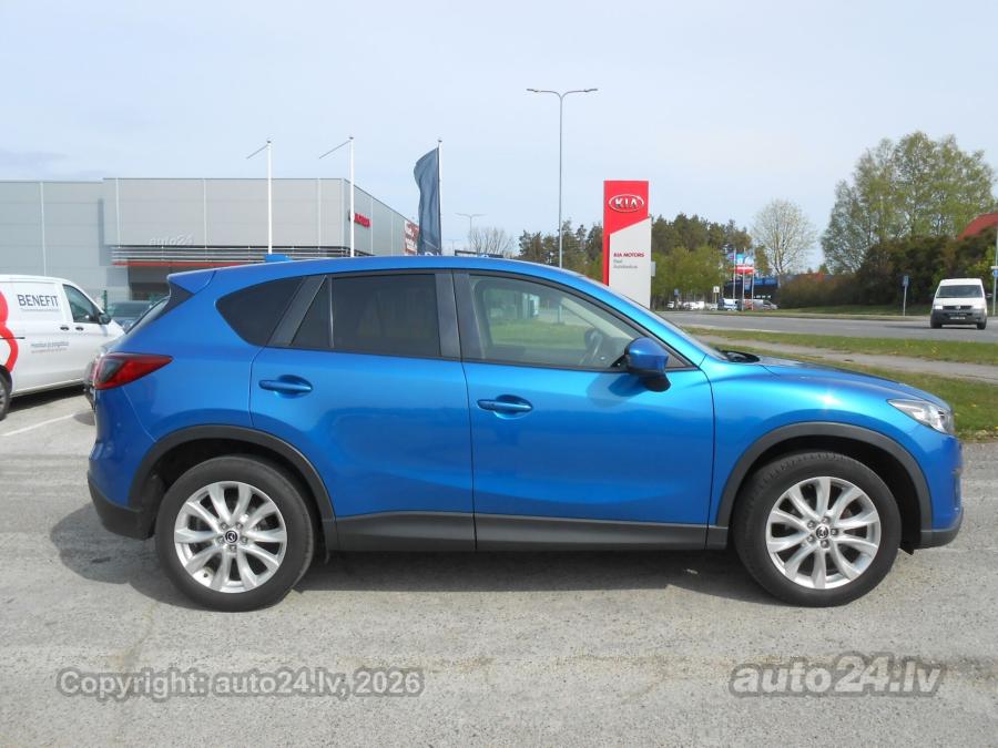 Blue Mazda CX-5 2013 in Viljandi, with an engine capacity of 2.20 L and mileage of 226 thousand km for 7990 €, photo 21 on AUTOMOTO.COM.LV
