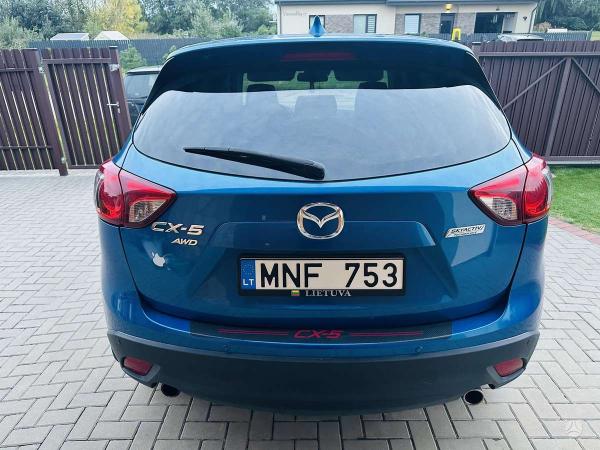 Mazda CX-5 2013 in Panevezys on AUTOMOTO.COM.LV Blue Mazda CX-5 2013 in Panevezys, with an engine capacity of 2.00 L and mileage of 201 thousand km for 10200 €, photo 5 on AUTOMOTO.COM.LV