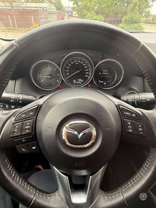 Blue Mazda CX-5 2013 in Plunge, with an engine capacity of 2.19 L and mileage of 170 thousand km for 6400 €, photo 7 on AUTOMOTO.COM.LV