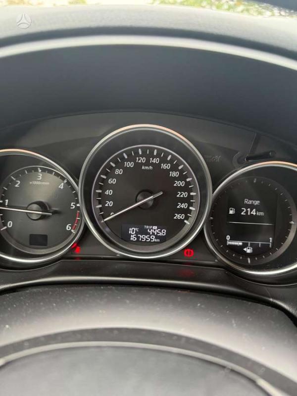 Blue Mazda CX-5 2013 in Plunge, with an engine capacity of 2.19 L and mileage of 170 thousand km for 6400 €, photo 8 on AUTOMOTO.COM.LV