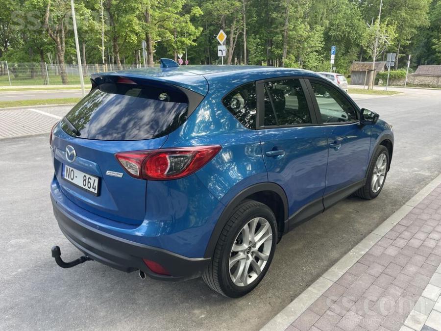 Zils Mazda CX-5 2013 Cēsis, ar dzinēja tilpumu 2.20 L un nobraukumu 312 tūkst. km par 7250 €, foto 5 vietnē AUTOMOTO.COM.LV
