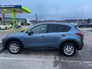 Blue Mazda CX-5 2014 in Riga, with an engine capacity of 2.00 L and mileage of 111 thousand km for 9500 €, photo  on AUTOMOTO.COM.LV