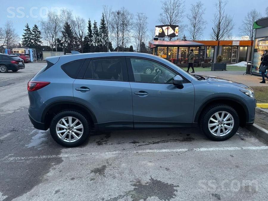 Blue Mazda CX-5 2014 in Riga, with an engine capacity of 2.00 L and mileage of 111 thousand km for 9500 €, photo 2 on AUTOMOTO.COM.LV