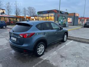 Blue Mazda CX-5 2014 in Riga, with an engine capacity of 2.00 L and mileage of 111 thousand km for 9500 €, photo 3 on AUTOMOTO.COM.LV