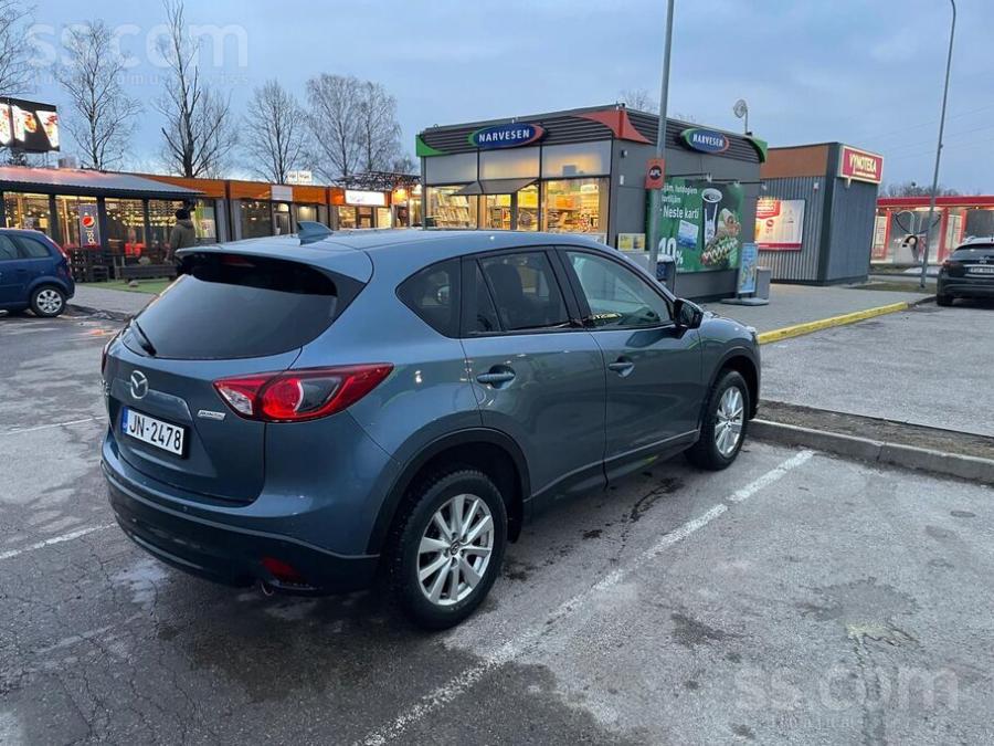 Blue Mazda CX-5 2014 in Riga, with an engine capacity of 2.00 L and mileage of 111 thousand km for 9500 €, photo 3 on AUTOMOTO.COM.LV
