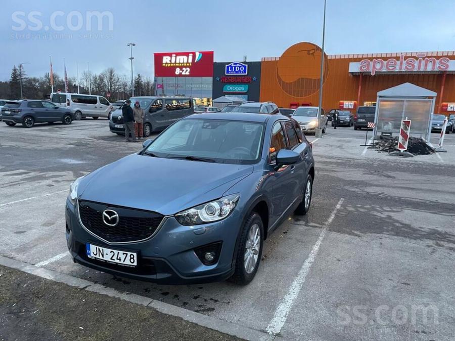 Blue Mazda CX-5 2014 in Riga, with an engine capacity of 2.00 L and mileage of 111 thousand km for 9500 €, photo 5 on AUTOMOTO.COM.LV