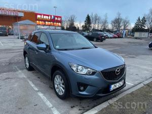 Blue Mazda CX-5 2014 in Riga, with an engine capacity of 2.00 L and mileage of 111 thousand km for 9500 €, photo 6 on AUTOMOTO.COM.LV