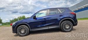 Blue Mazda CX-5 2014 in Daugavpils, with an engine capacity of 2.20 L and mileage of 235 thousand km for 7450 €, photo 3 on AUTOMOTO.COM.LV