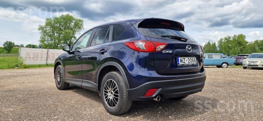 Blue Mazda CX-5 2014 in Daugavpils, with an engine capacity of 2.20 L and mileage of 235 thousand km for 7450 €, photo 4 on AUTOMOTO.COM.LV