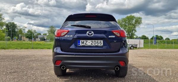 Zils Mazda CX-5 2014 Daugavpils, ar dzinēja tilpumu 2.20 L un nobraukumu 235 tūkst. km par 7450 €, foto 4 vietnē AUTOMOTO.COM.LV