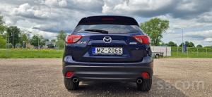 Blue Mazda CX-5 2014 in Daugavpils, with an engine capacity of 2.20 L and mileage of 235 thousand km for 7450 €, photo 5 on AUTOMOTO.COM.LV