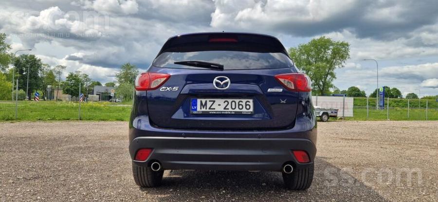 Blue Mazda CX-5 2014 in Daugavpils, with an engine capacity of 2.20 L and mileage of 235 thousand km for 7450 €, photo 5 on AUTOMOTO.COM.LV