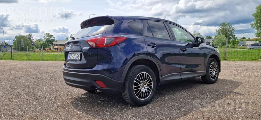 Blue Mazda CX-5 2014 in Daugavpils, with an engine capacity of 2.20 L and mileage of 235 thousand km for 7450 €, photo 6 on AUTOMOTO.COM.LV