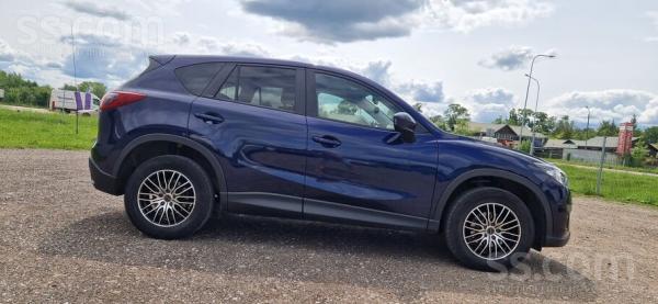 Zils Mazda CX-5 2014 Daugavpils, ar dzinēja tilpumu 2.20 L un nobraukumu 235 tūkst. km par 7450 €, foto 6 vietnē AUTOMOTO.COM.LV
