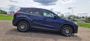 Blue Mazda CX-5 2014 in Daugavpils, with an engine capacity of 2.20 L and mileage of 235 thousand km for 7450 €, photo 7 on AUTOMOTO.COM.LV