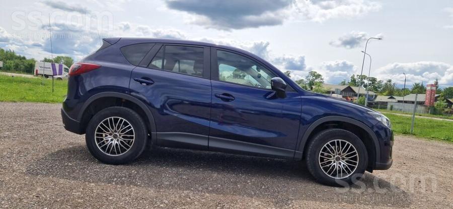 Blue Mazda CX-5 2014 in Daugavpils, with an engine capacity of 2.20 L and mileage of 235 thousand km for 7450 €, photo 7 on AUTOMOTO.COM.LV