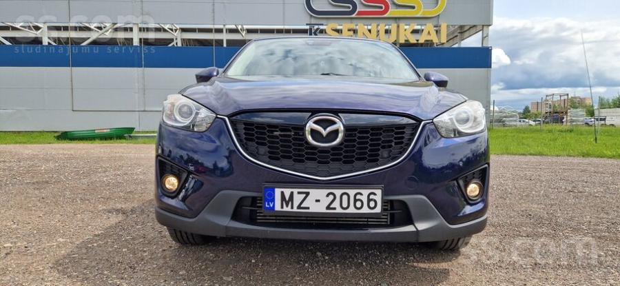 Blue Mazda CX-5 2014 in Daugavpils, with an engine capacity of 2.20 L and mileage of 235 thousand km for 7450 €, photo 9 on AUTOMOTO.COM.LV