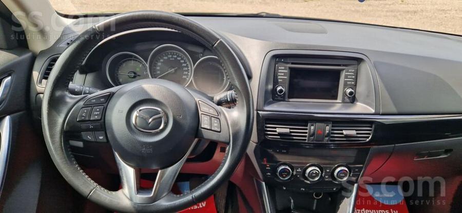 Blue Mazda CX-5 2014 in Daugavpils, with an engine capacity of 2.20 L and mileage of 235 thousand km for 7450 €, photo 11 on AUTOMOTO.COM.LV