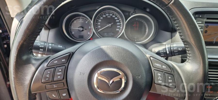 Blue Mazda CX-5 2014 in Daugavpils, with an engine capacity of 2.20 L and mileage of 235 thousand km for 7450 €, photo 17 on AUTOMOTO.COM.LV