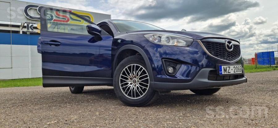 Blue Mazda CX-5 2014 in Daugavpils, with an engine capacity of 2.20 L and mileage of 235 thousand km for 7450 €, photo 33 on AUTOMOTO.COM.LV