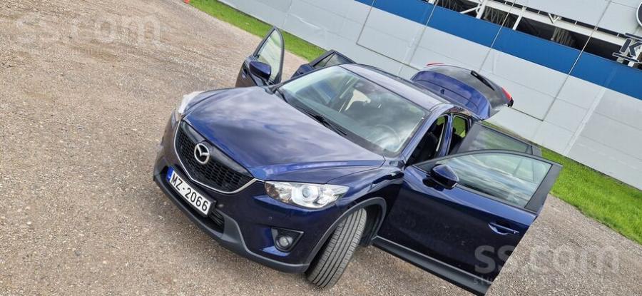 Blue Mazda CX-5 2014 in Daugavpils, with an engine capacity of 2.20 L and mileage of 235 thousand km for 7450 €, photo 34 on AUTOMOTO.COM.LV