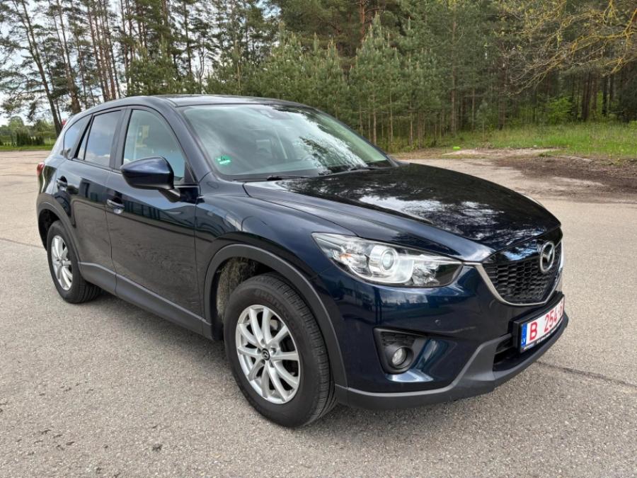 Blue Mazda CX-5 2014 in Riga, with an engine capacity of 2.20 L and mileage of 181 thousand km for 6900 €, photo 4 on AUTOMOTO.COM.LV