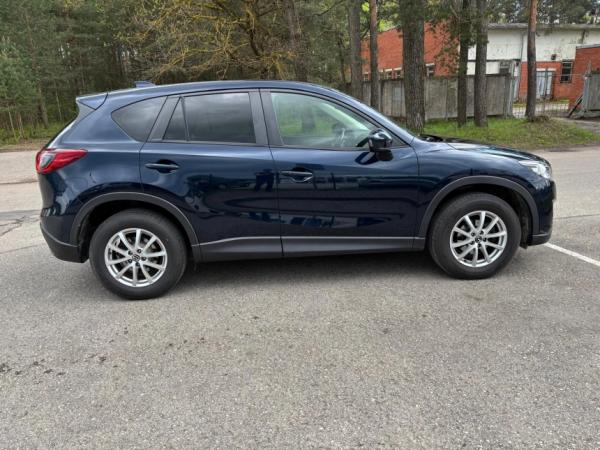 Blue Mazda CX-5 2014 in Riga, with an engine capacity of 2.20 L and mileage of 181 thousand km for 6900 €, photo 4 on AUTOMOTO.COM.LV