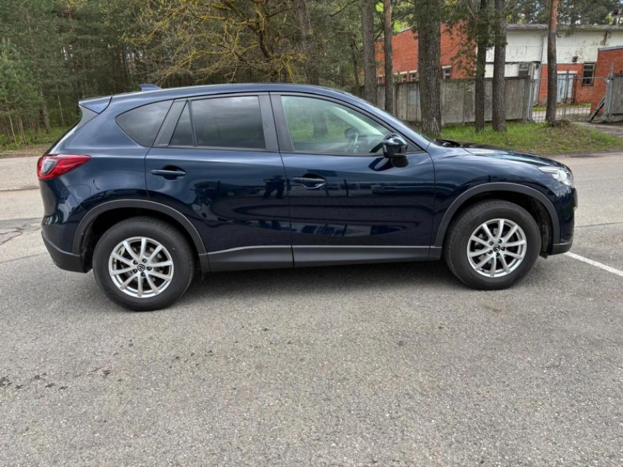 Blue Mazda CX-5 2014 in Riga, with an engine capacity of 2.20 L and mileage of 181 thousand km for 6900 €, photo 5 on AUTOMOTO.COM.LV