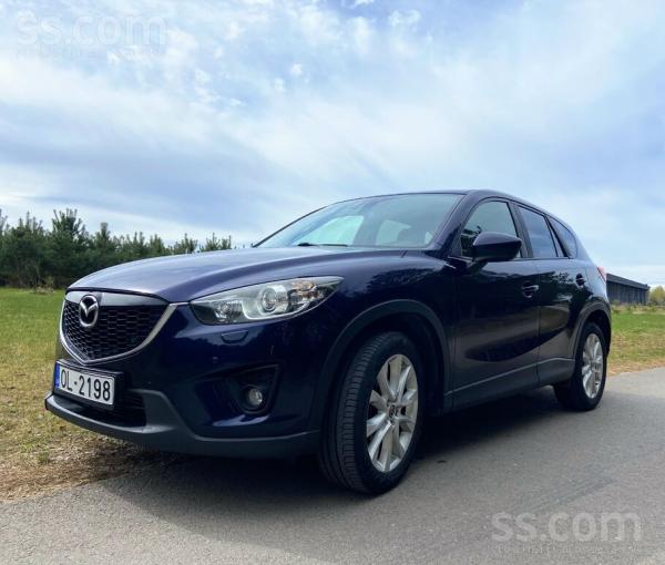 Zils Mazda CX-5 2014 Rīga, ar dzinēja tilpumu 2.00 L un nobraukumu 305 tūkst. km par 7900 €, foto 1 vietnē AUTOMOTO.COM.LV